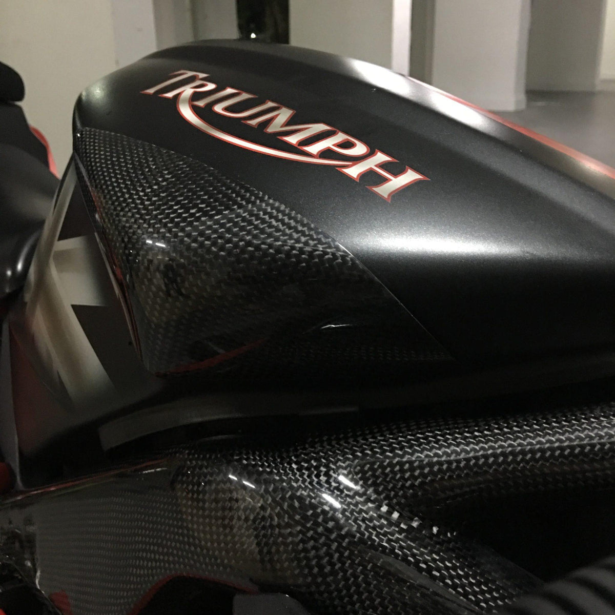 CARBON2RACE Triumph Daytona 675 (06/12) Carbon Tank Sliders – 2Wheels Hero